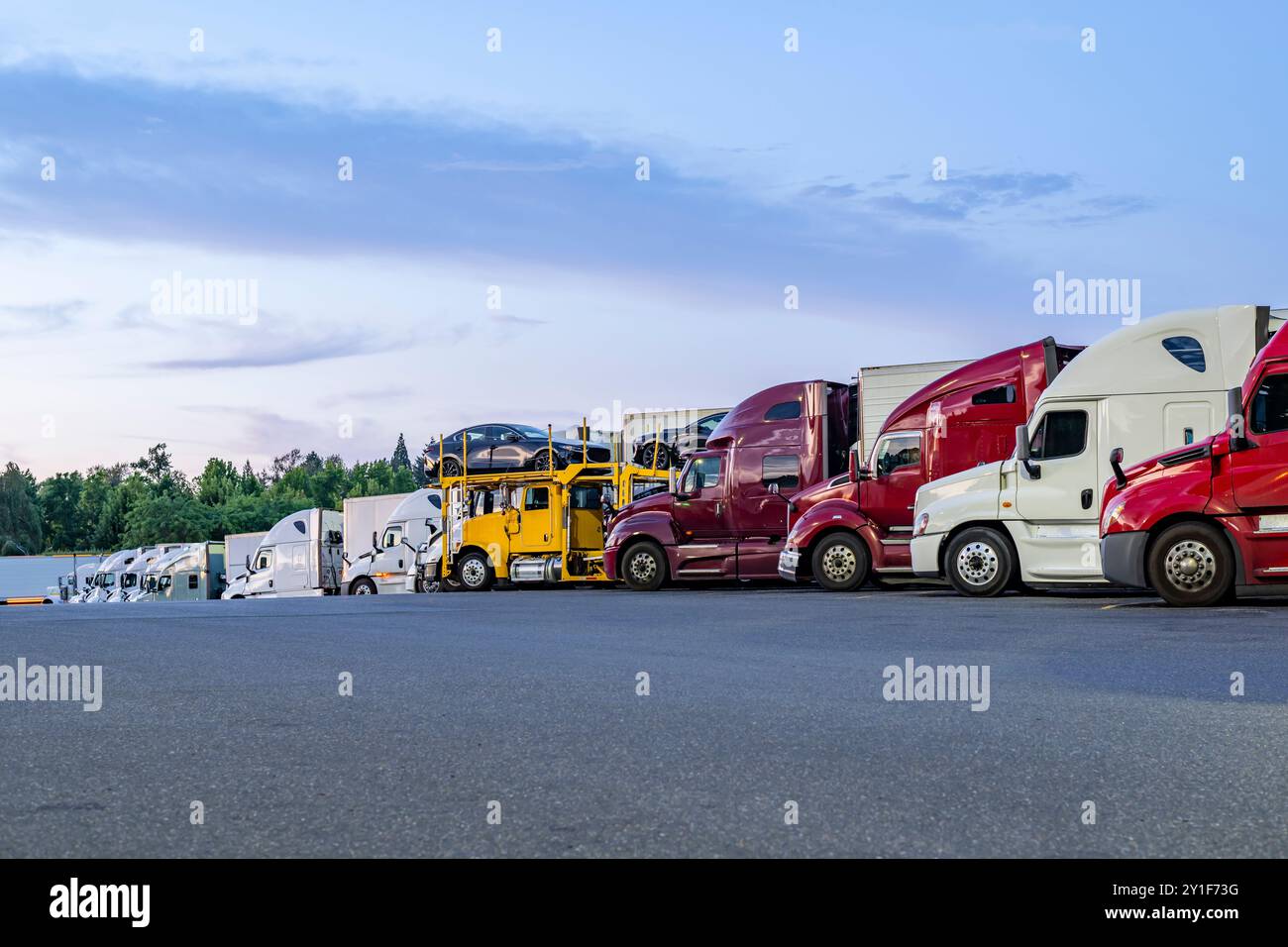 Industrial long hauler carriers big rigs semi trucks with loaded semi ...