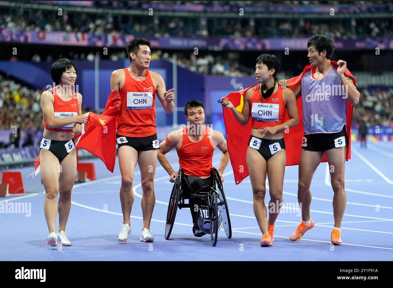 China's Xiayan Wen, Hao Wang, Yang Hu and Guohua Zhou celebrate gold in the 4x100m Universal ...