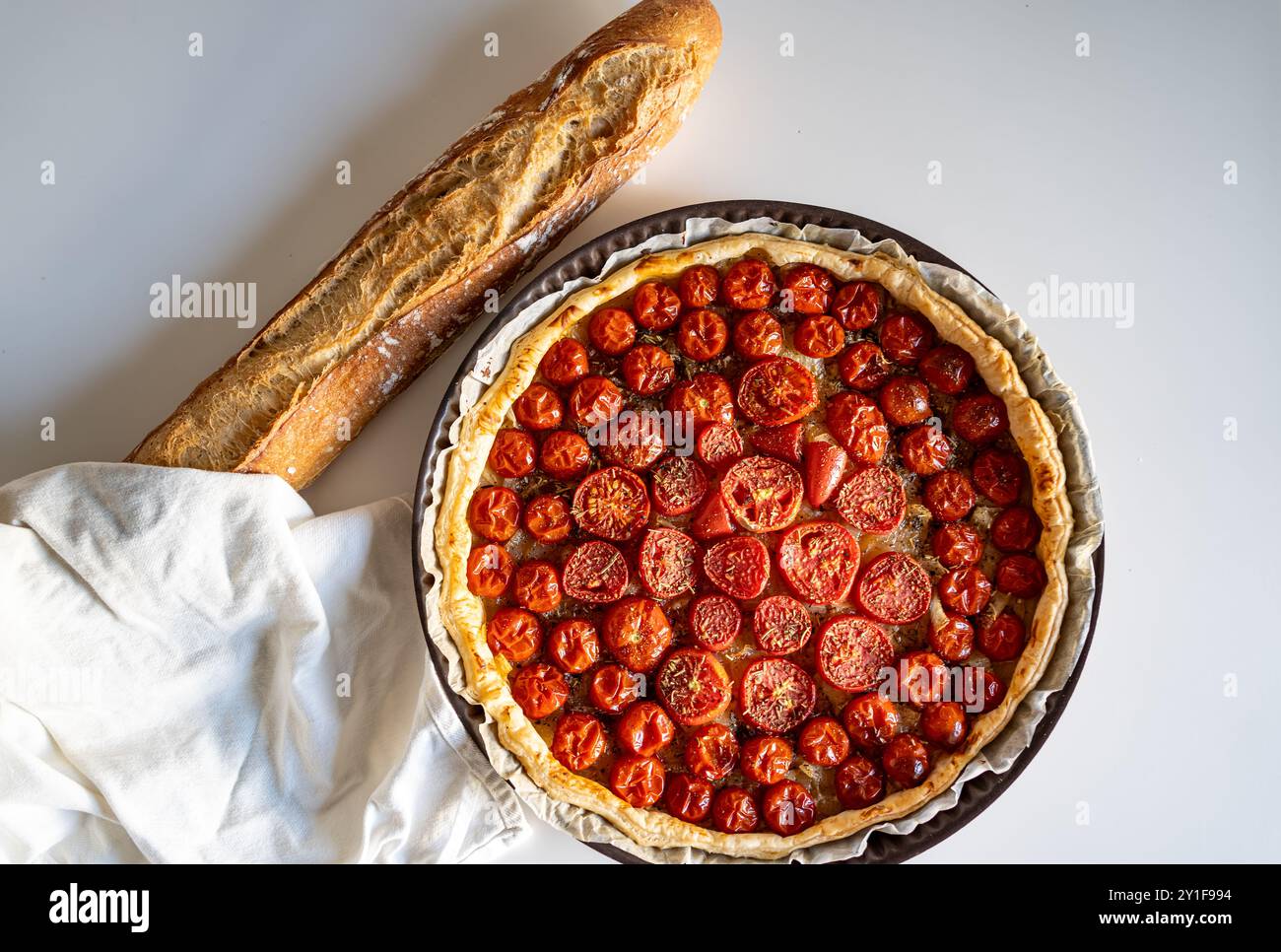 Delicious homemade rustic open pie (galette) with cherry tomatoes and ...