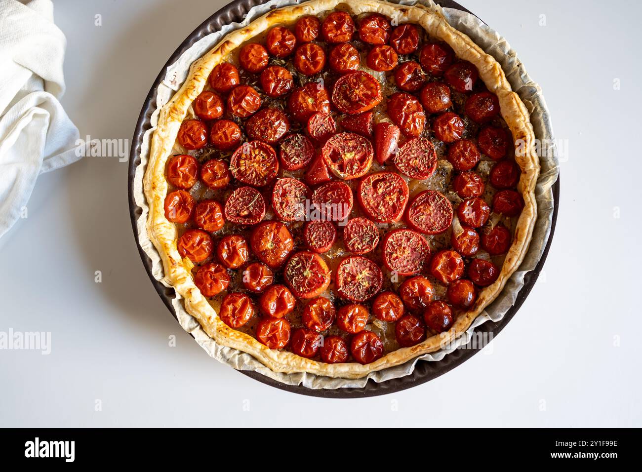 Delicious homemade rustic open pie (galette) with cherry tomatoes and ...