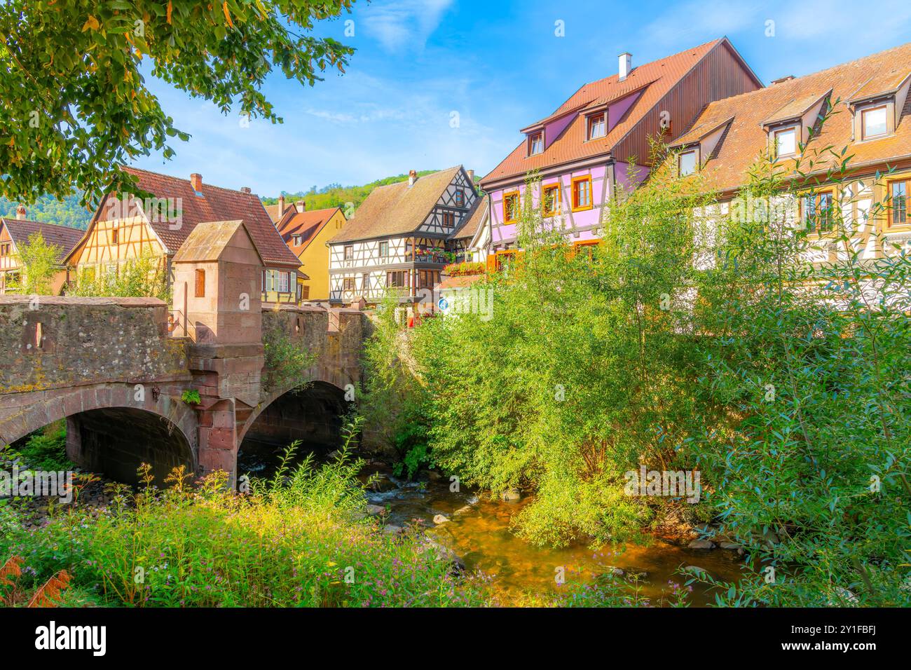 Colorful medieval half timbered homes near the Fortified Bridge and ...