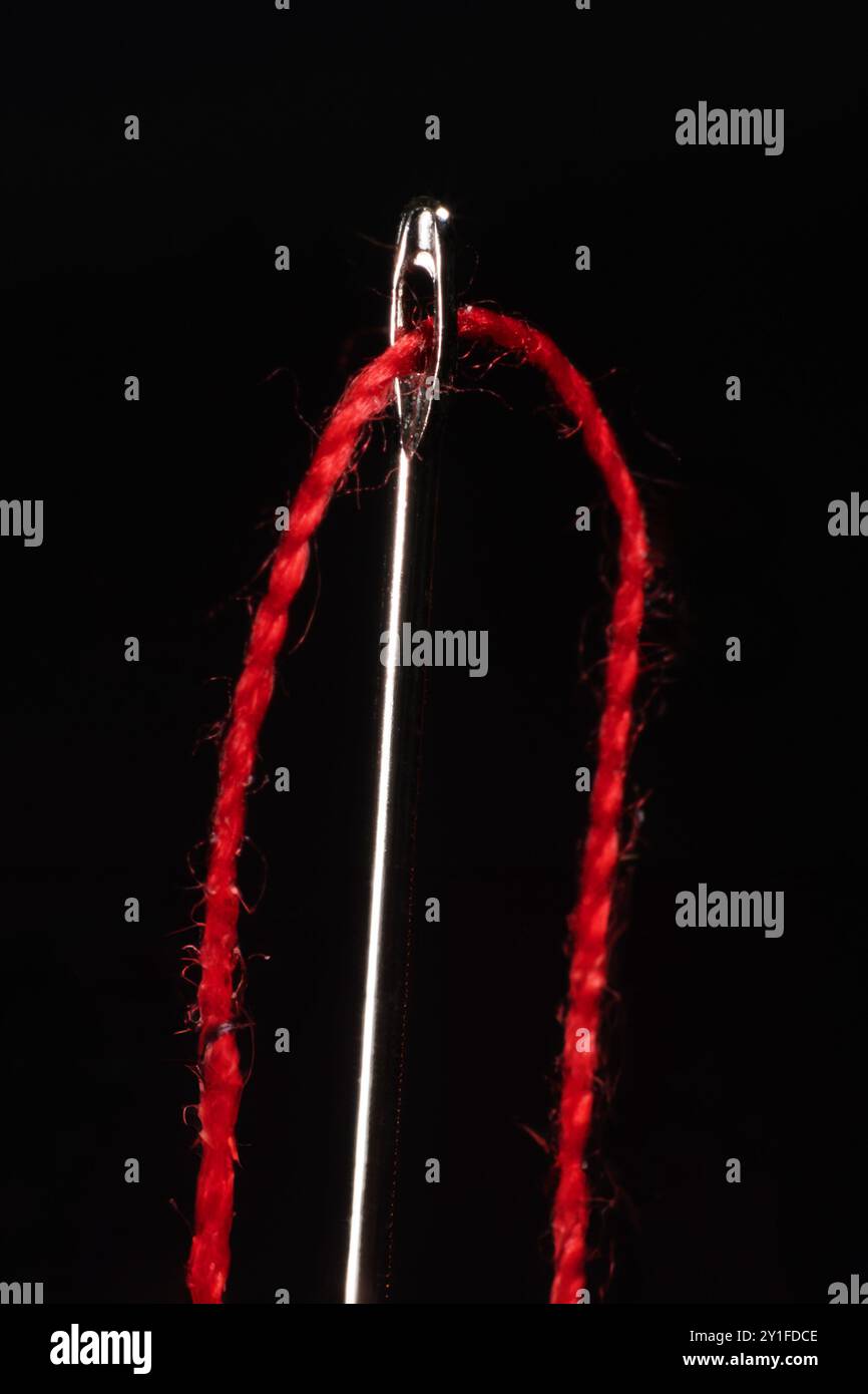 Small hole needle thread hi-res stock photography and images - Alamy