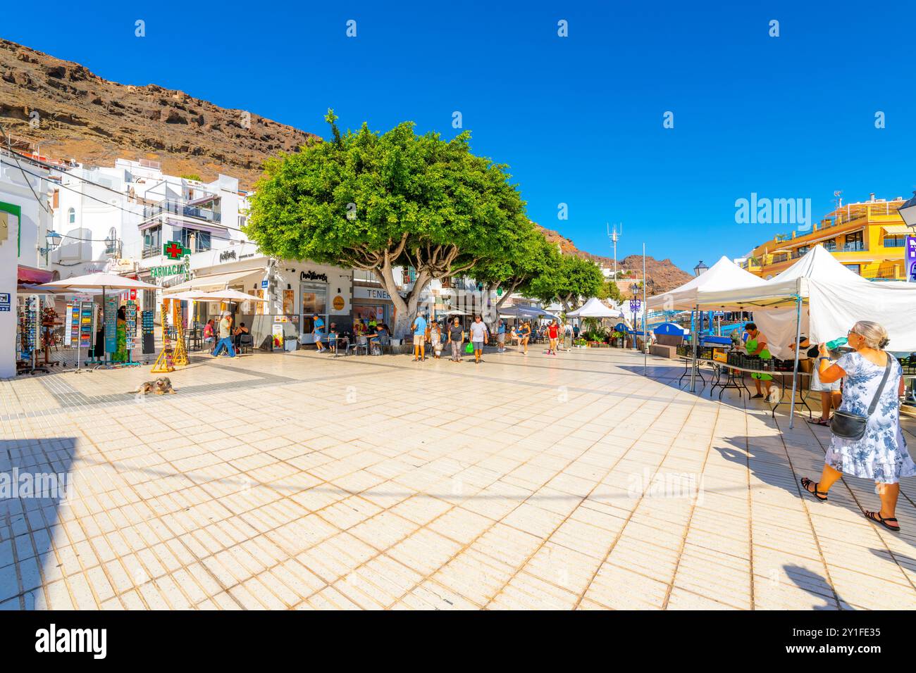 A picturesque square of shops, markets and cafes in old town of the ...