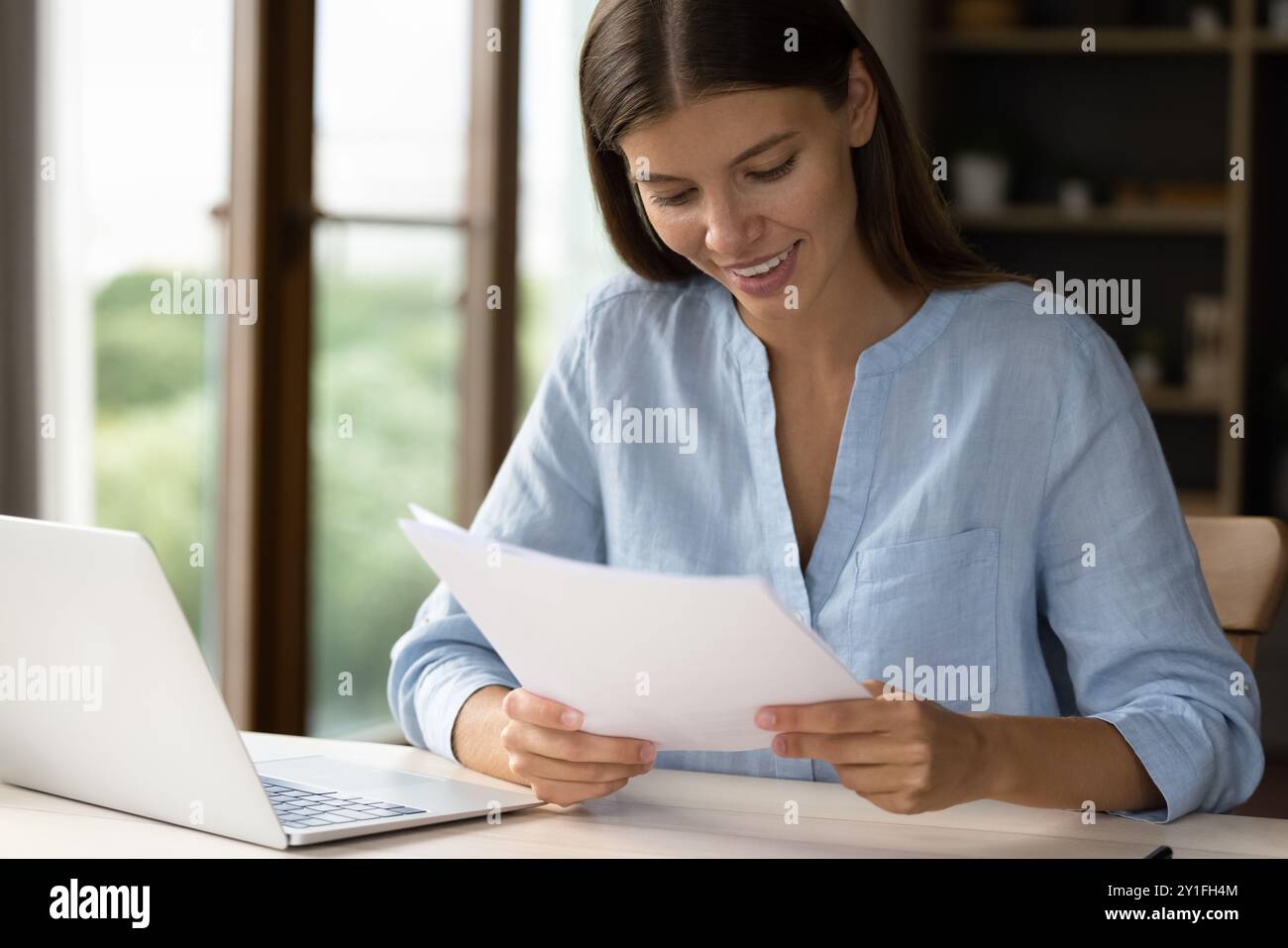 Happy student girl getting letter from university, college Stock Photo ...