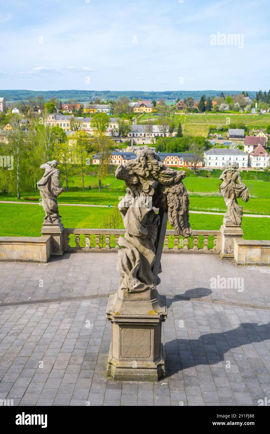 Baroque statues stand elegantly within the gardens of Kuks hospital ...