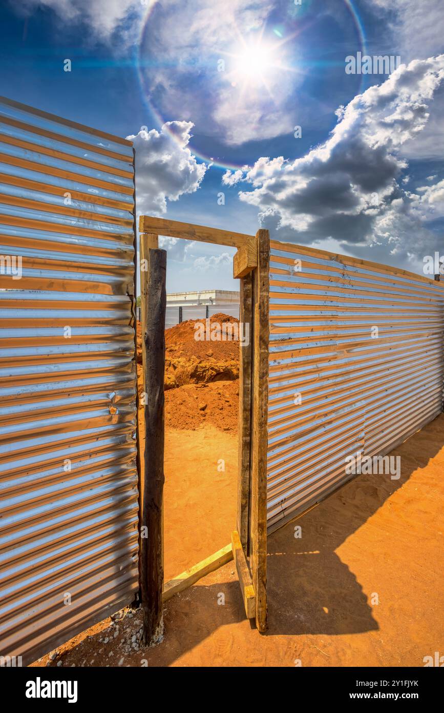 Blue corrugated iron fence hi-res stock photography and images - Alamy