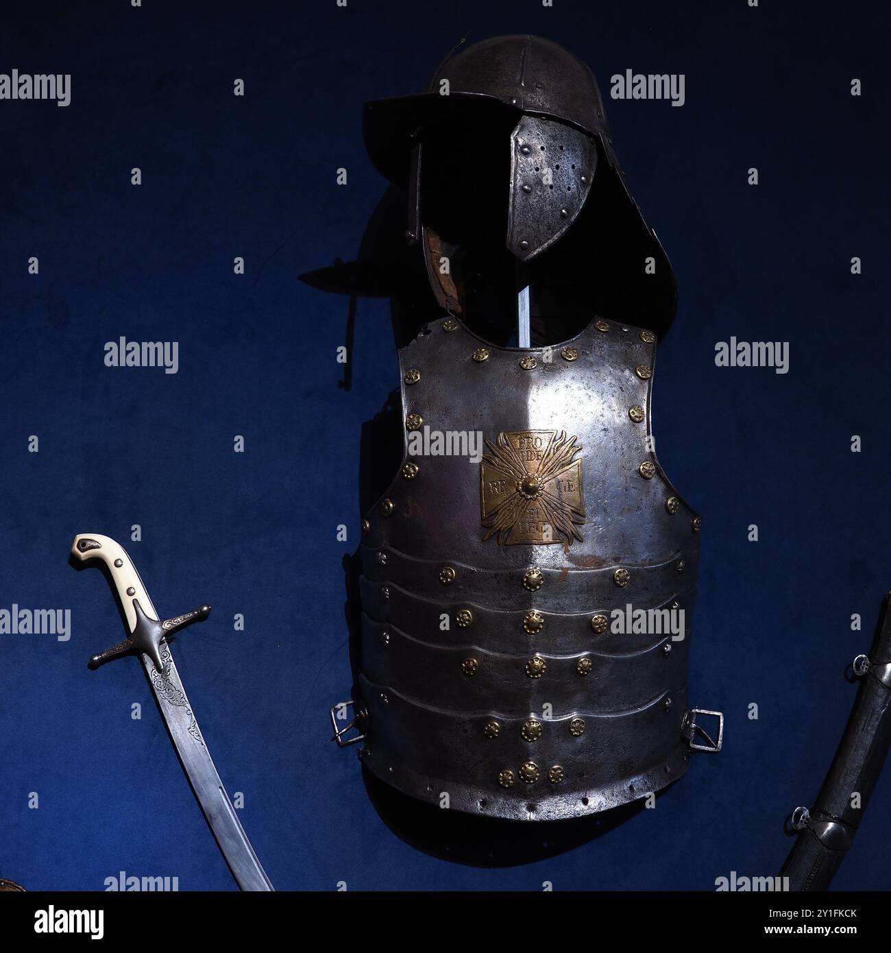 medieval armour on dark blue background Stock Photo - Alamy