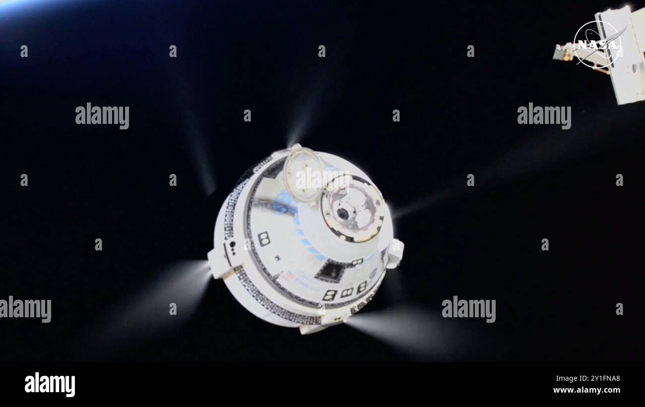In this image from video provided by NASA, the unmanned Boeing ...