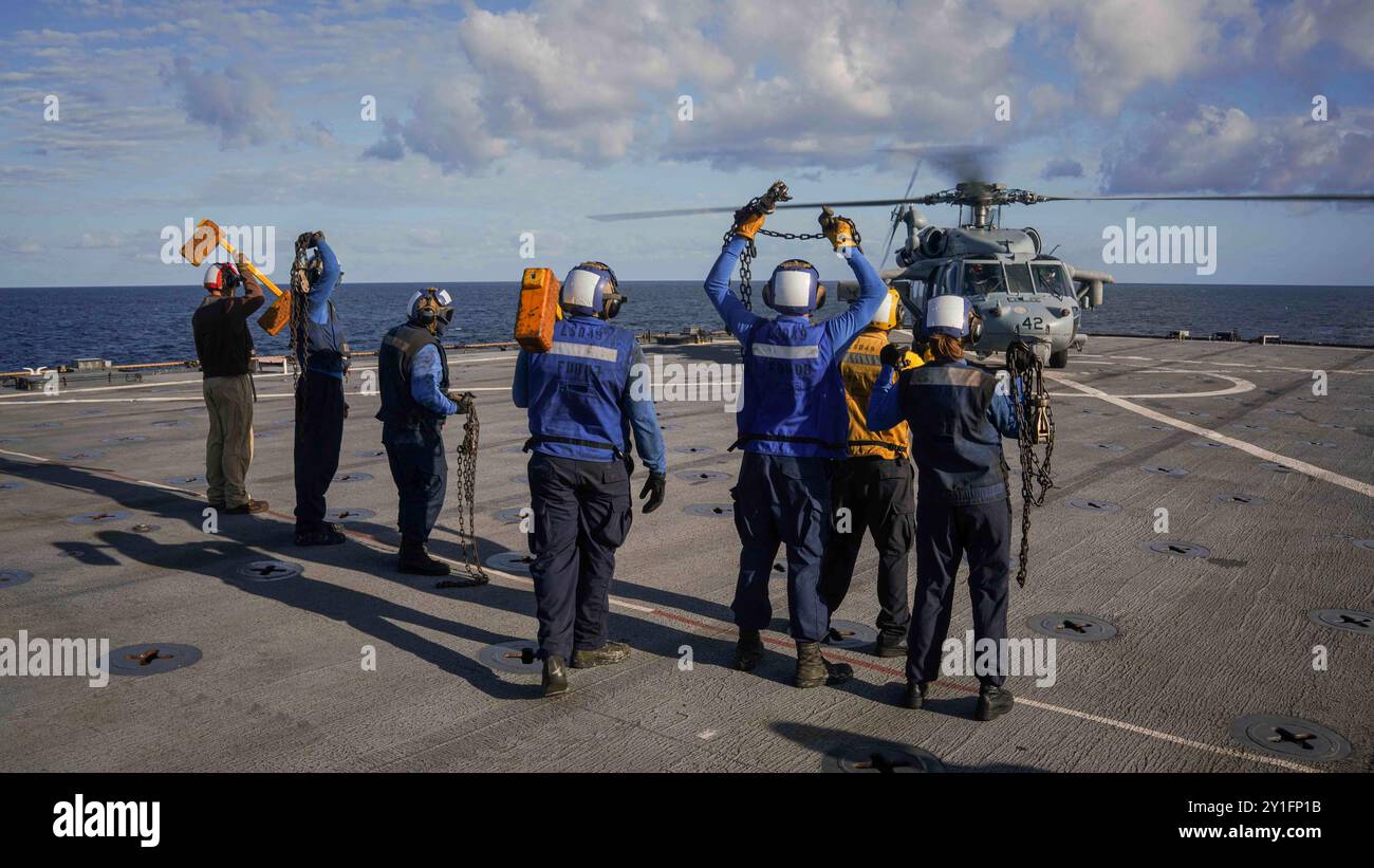 [240903-N-HV010-1053] U.S. Navy Sailors present chocks and chains to ...