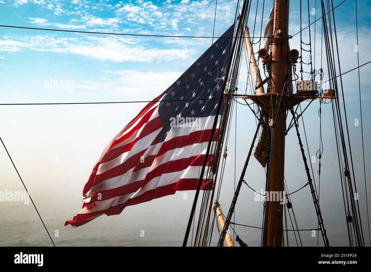 The American flag flies behind Coast Guard Cutter Eagle (WIX 327) while ...