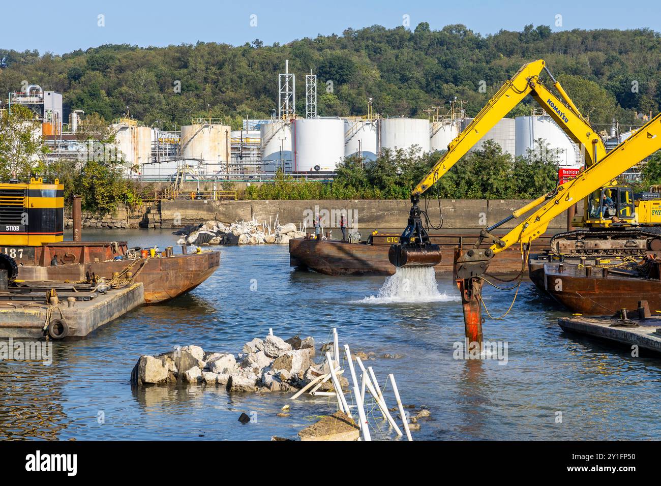The first industry towboat pushes barges through the newly-opened ...
