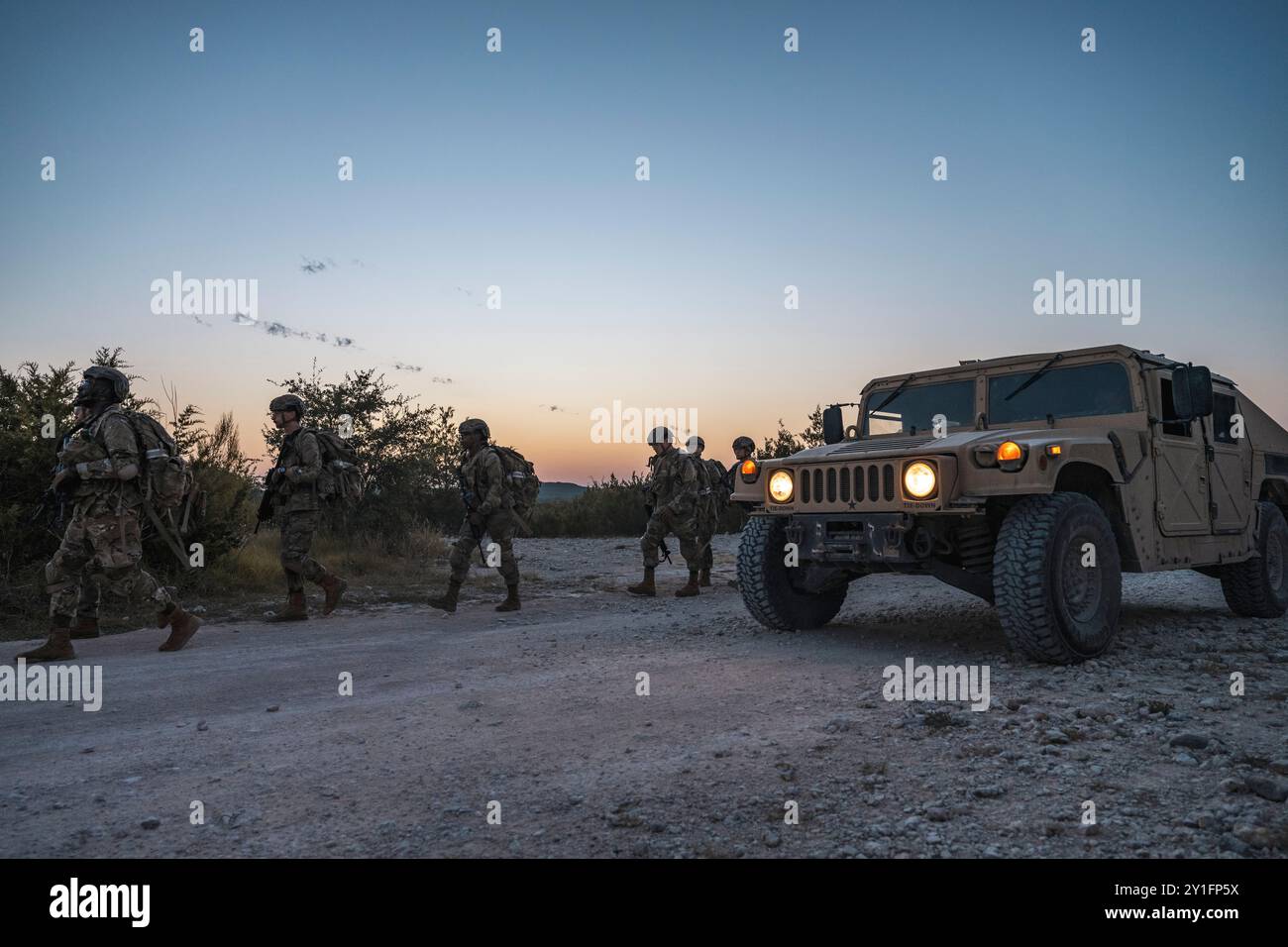 Security Forces trainees with the 343rd Training Squadron march to a ...