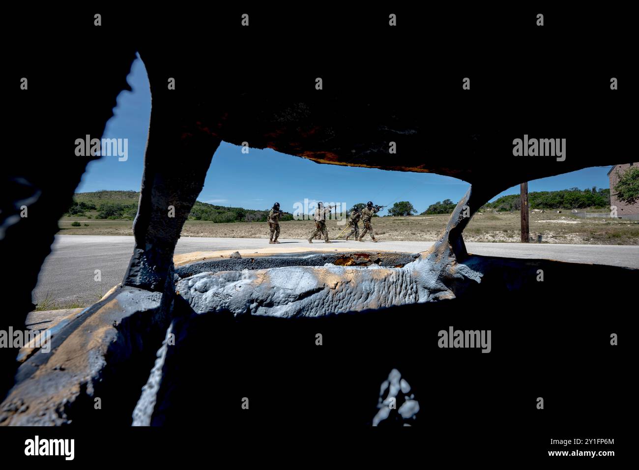 Security Forces trainees with the 343rd Training Squadron participate ...