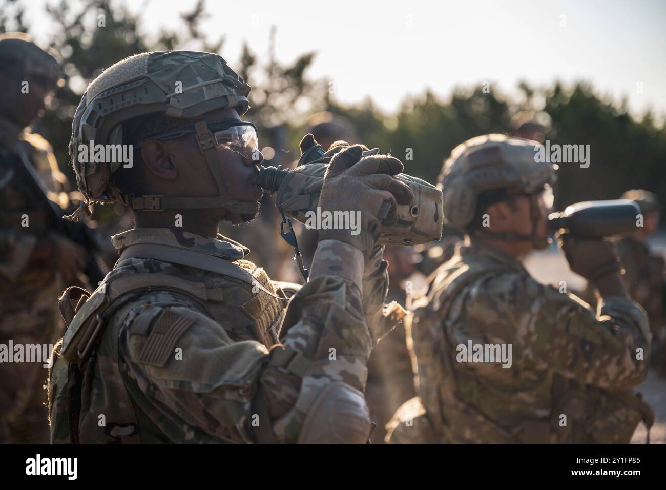 Security Forces trainees with the 343rd Training Squadron hydrate ...