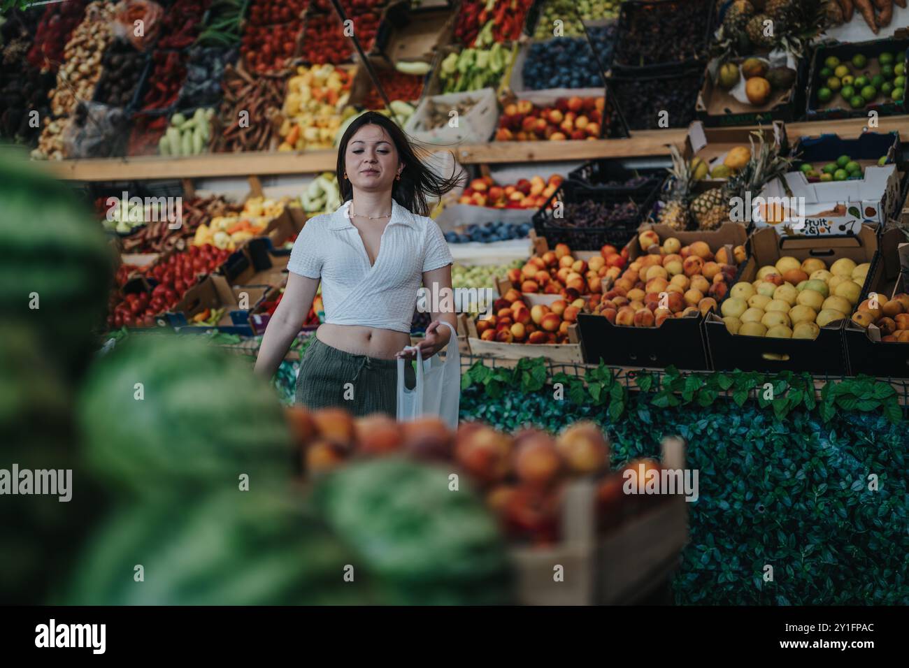 Woman buying fresh fruits and vegetables at outdoor market stand Stock ...
