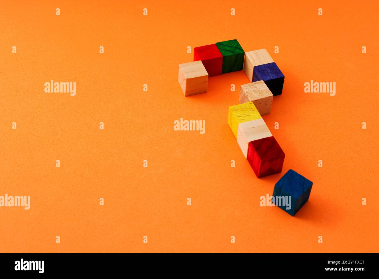 Wooden cubes forming question mark Stock Photo - Alamy