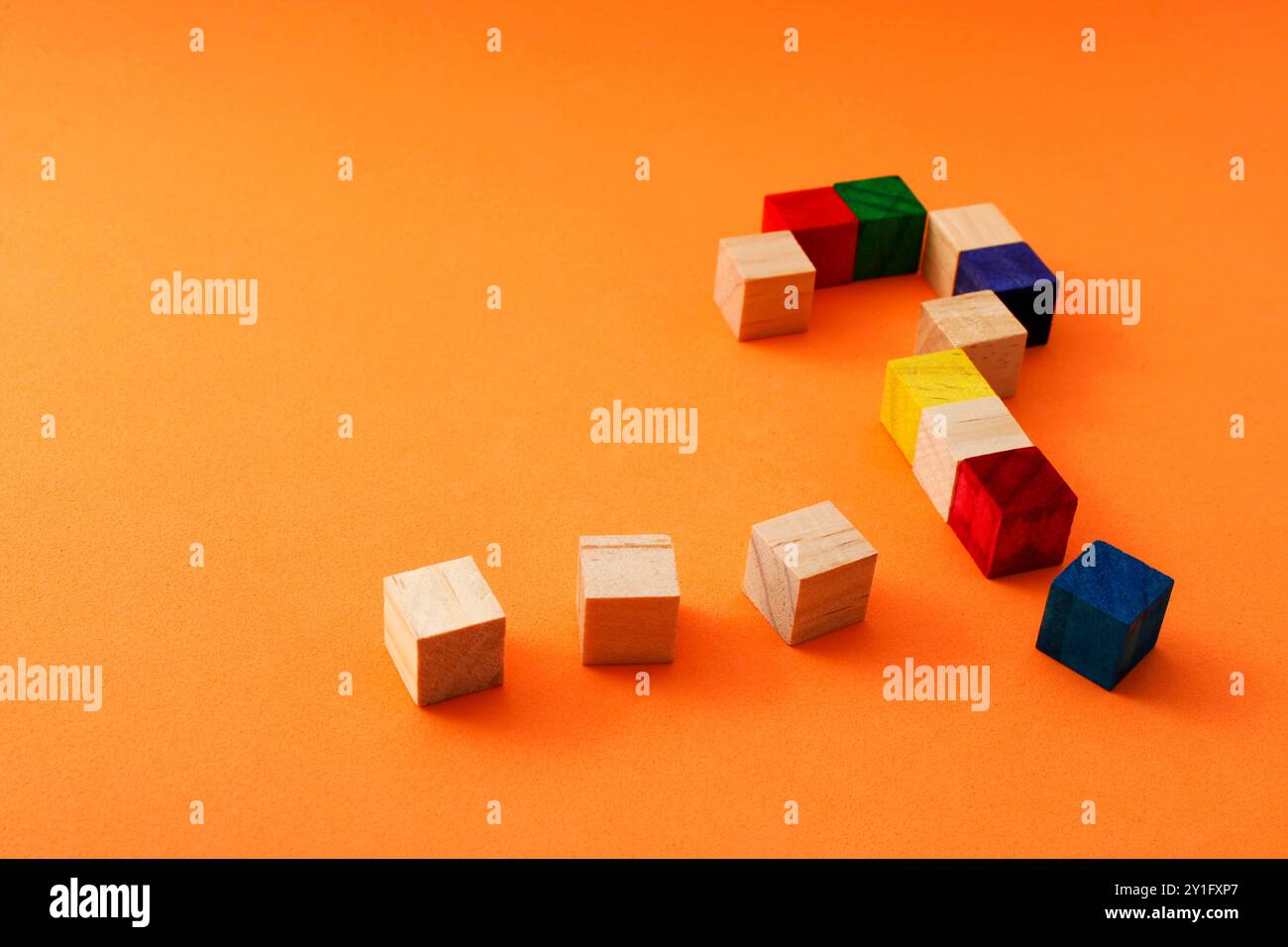 Ellipsis and question mark formed with wooden cubes Stock Photo - Alamy