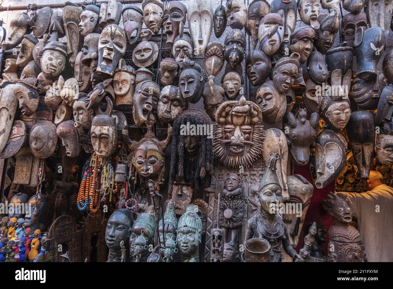 Typical African maks in a shop in a souk in Marrakech. Morocco Stock ...