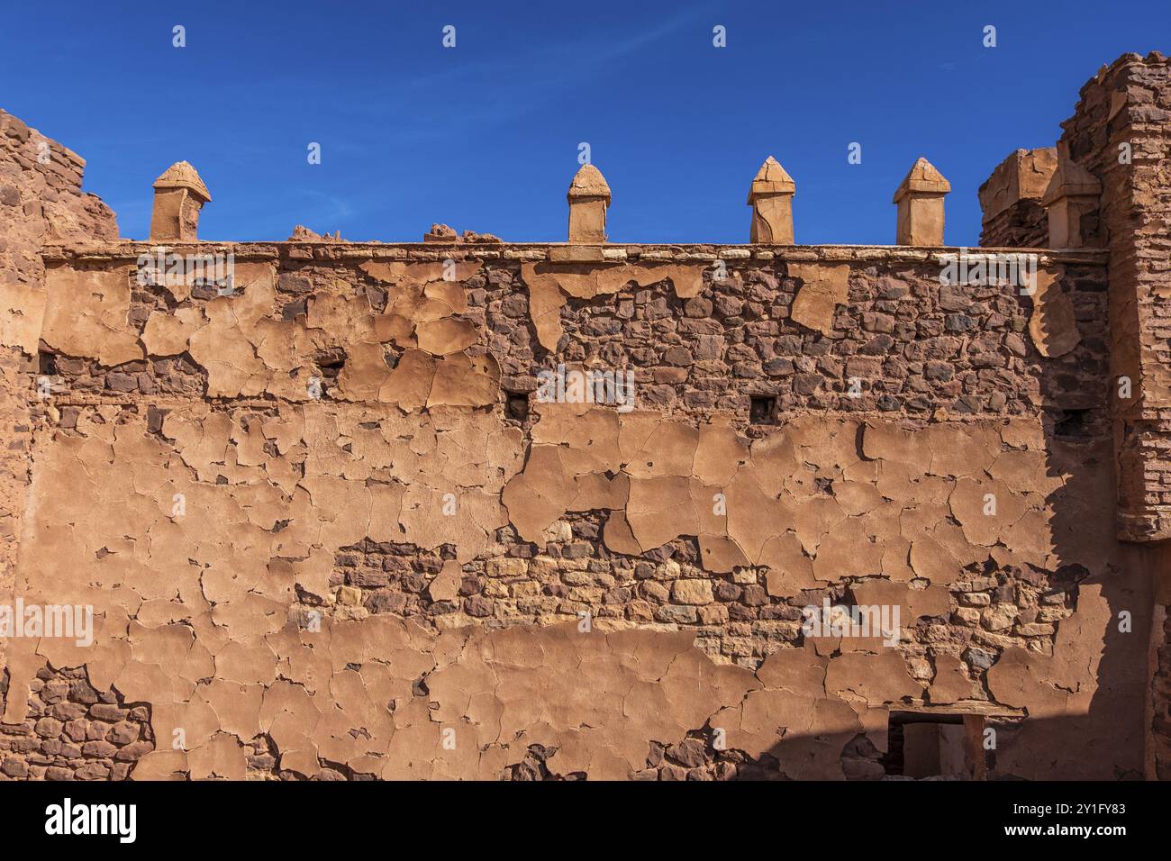 An old kasbah that served as a base for nomadic tribes, with a sense of ...