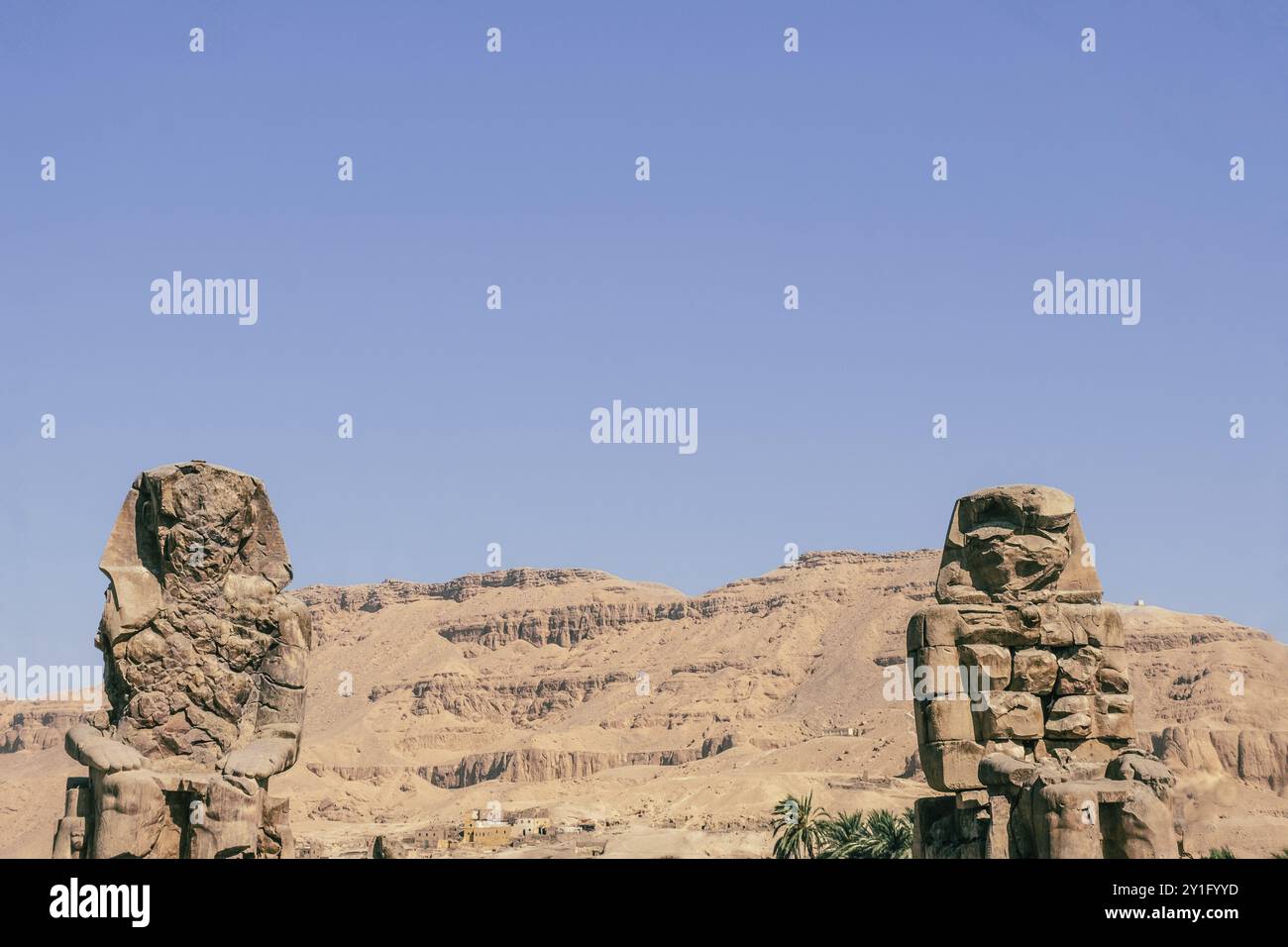 Behold the awe-inspiring Colossi of Memnon as they stand proudly in the ...