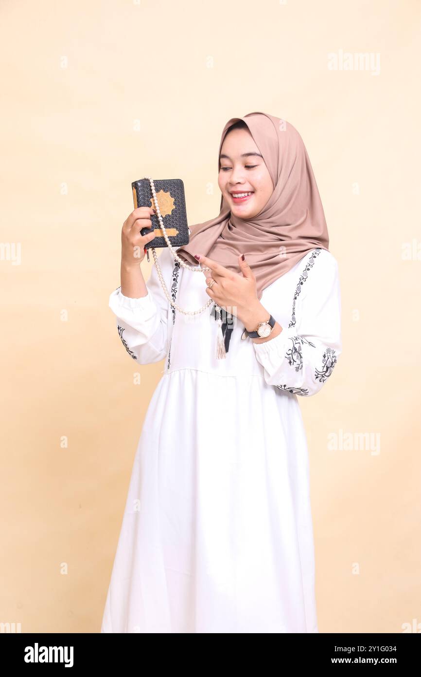 beautiful indonesia Muslim mature woman in hijab cheerful expression ...