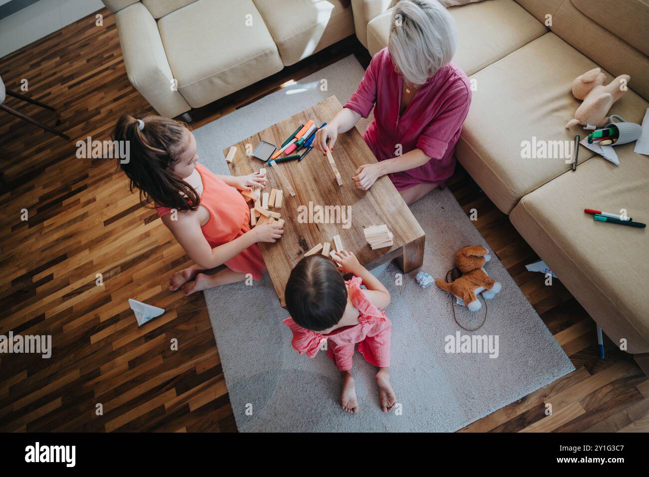 Family bonding time with children playing at home together Stock Photo ...