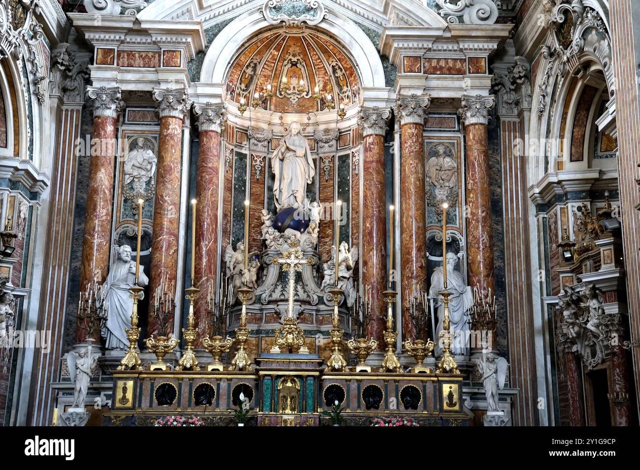 The main altar in Gesu Nuovo Church (New Jesus Church) in Naples Italy ...