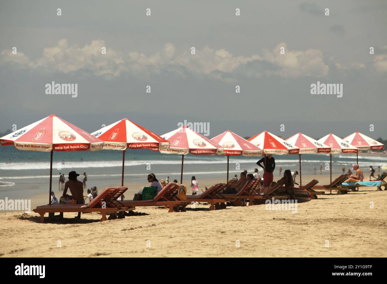 Sunshades for visitors on Kuta Beach, Badung, Bali, Indonesia Stock ...