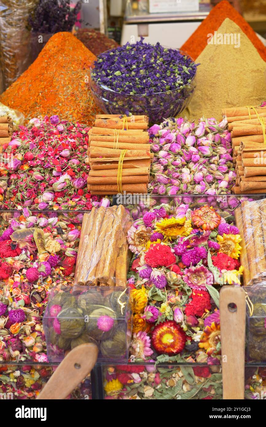 A delightful variety of colorful spices and dried flowers beautifully ...