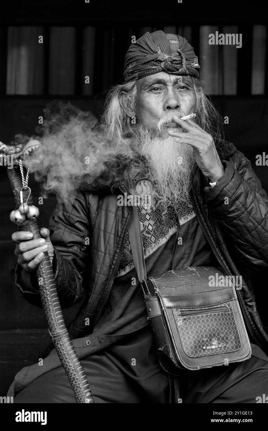 Man smoking walking stick hi-res stock photography and images - Alamy