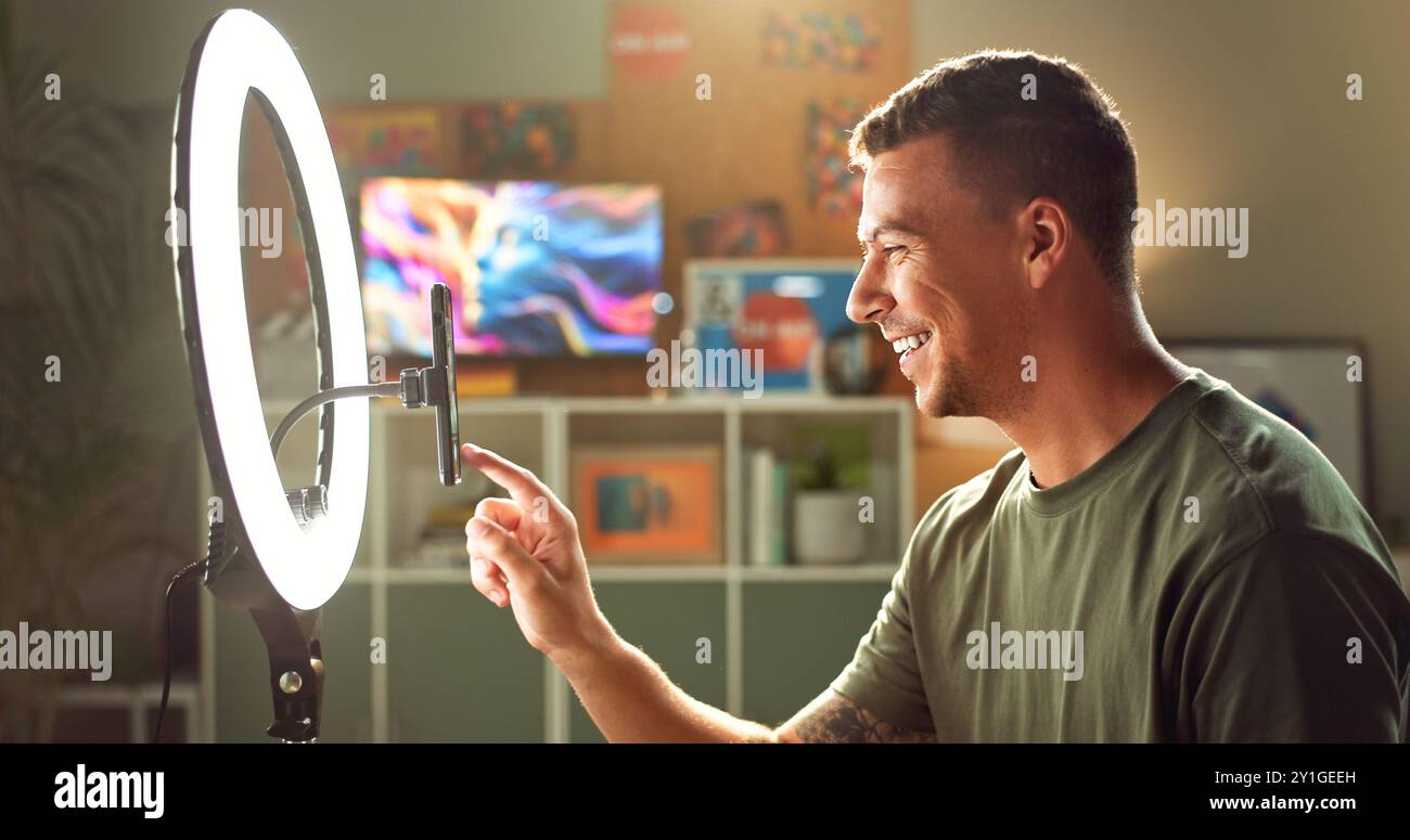 Influencer, ring light and smile at phone for streaming, follower ...