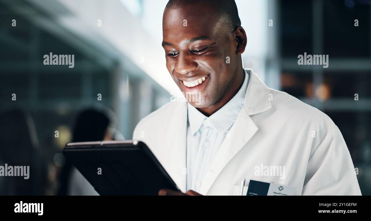 Black man, doctor and tablet with smile, night or reading with report ...