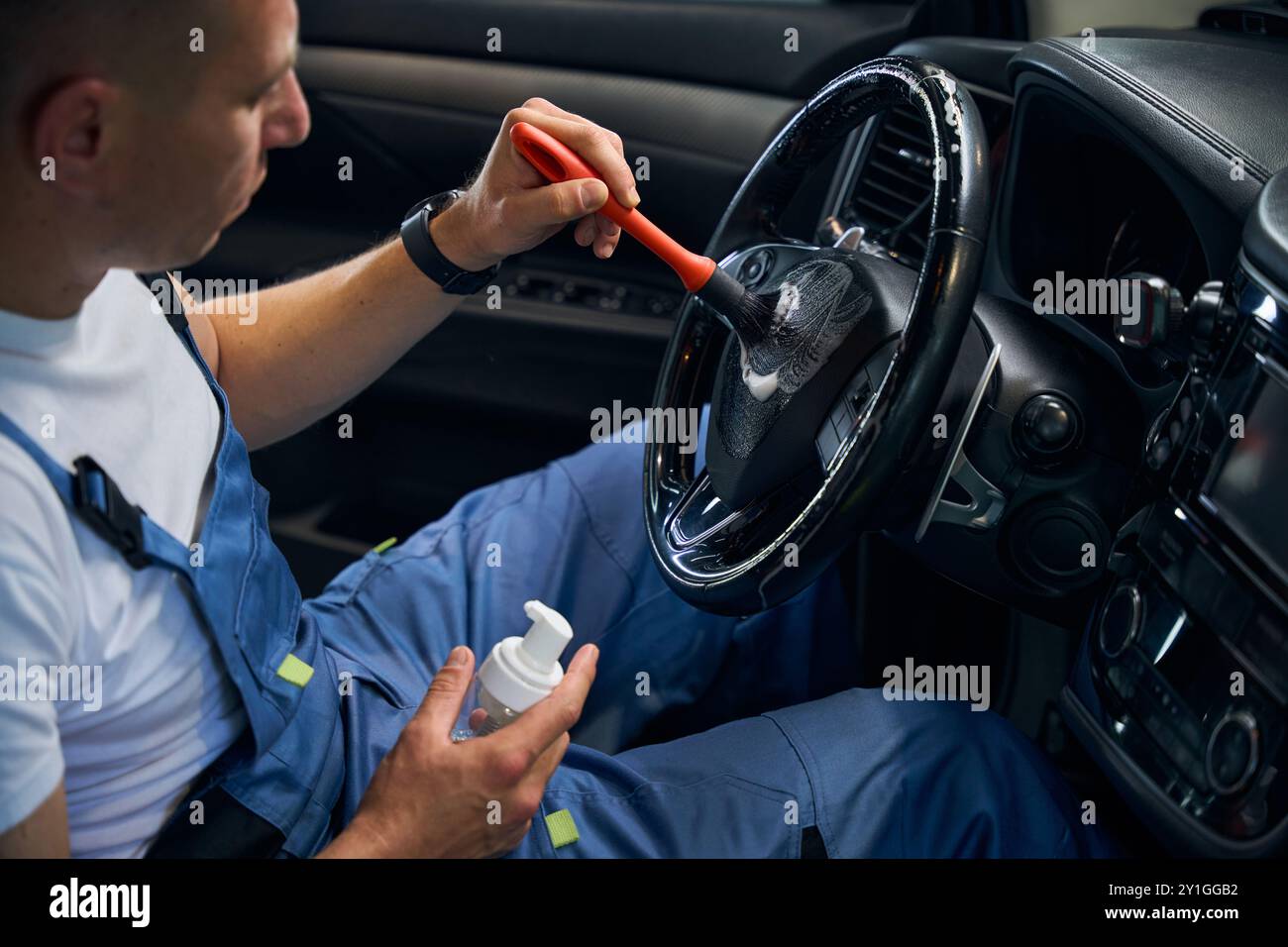 Young man uses smart watch hi-res stock photography and images - Alamy