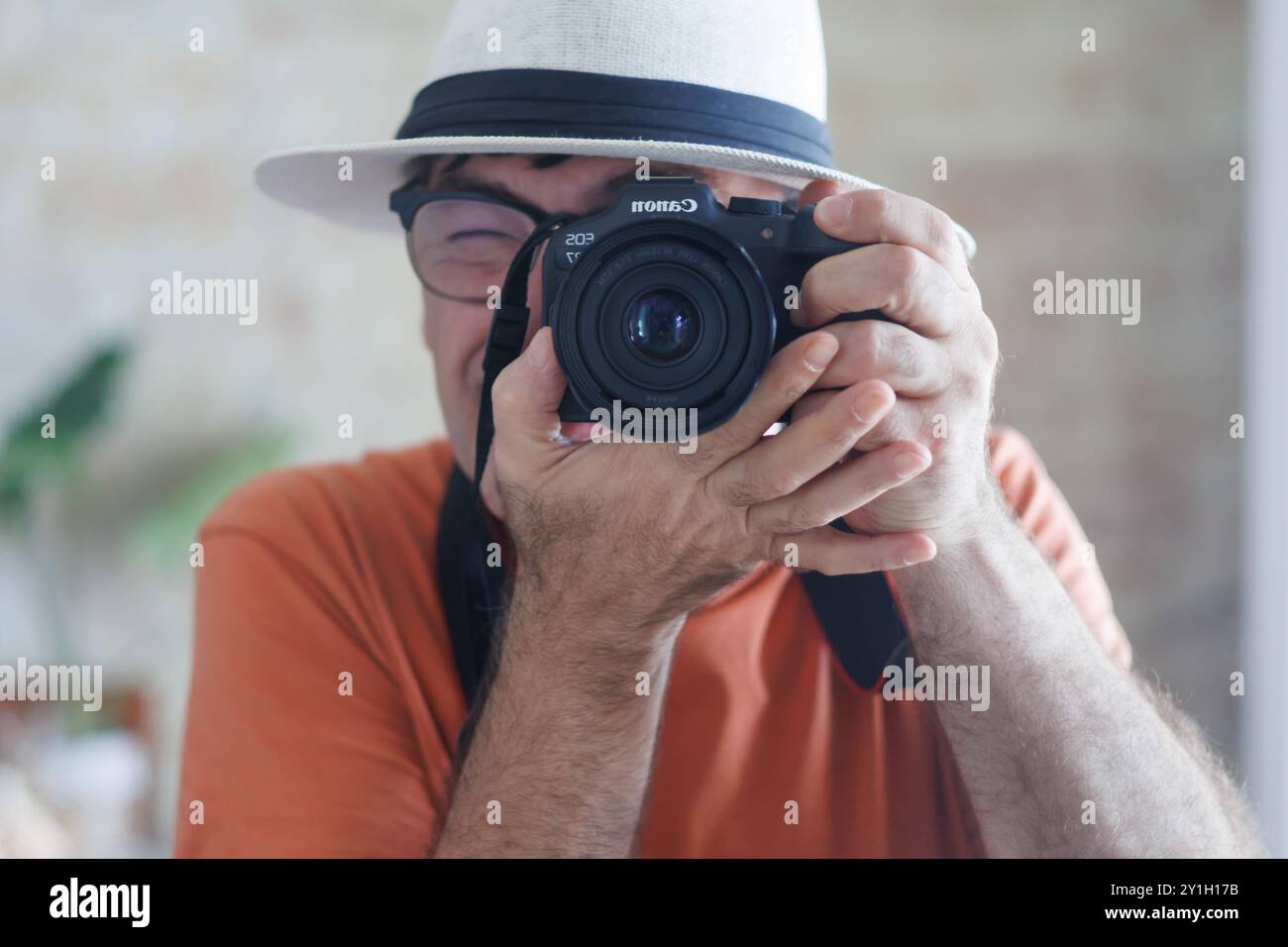 Self-portrait in the mirror with camera and hat. Los Arenales del Sol ...