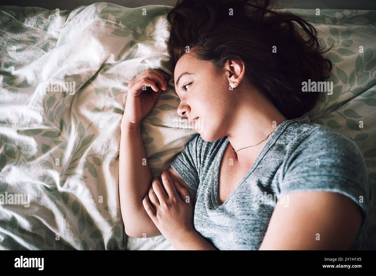 Mental health, insomnia and woman in bed with depression, anxiety or ...