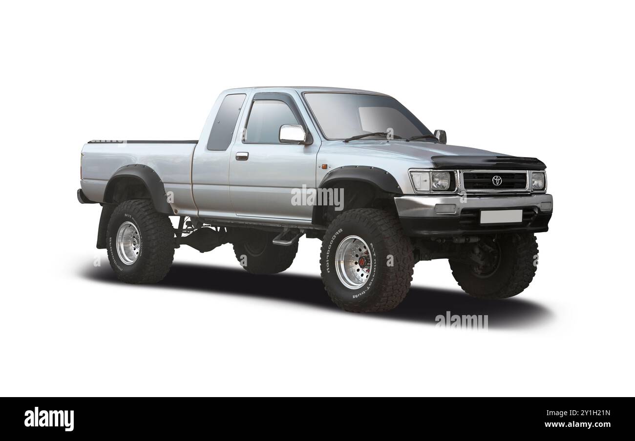 Toyota Hilux pickup truck side view isolated on white background Stock ...