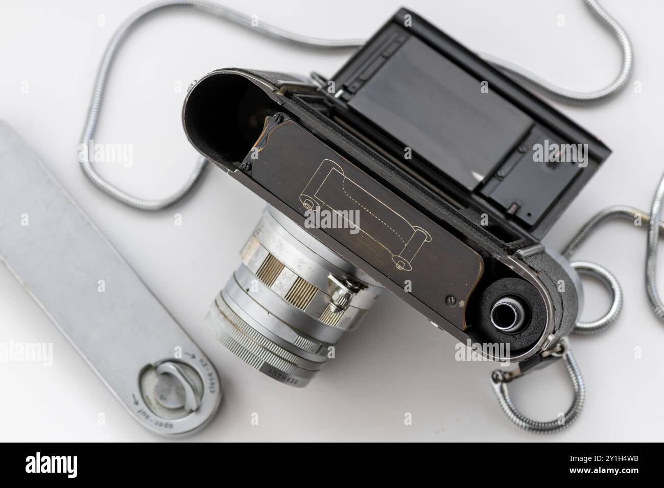 The open bottom and back compartment of a classic vintage camera for ...