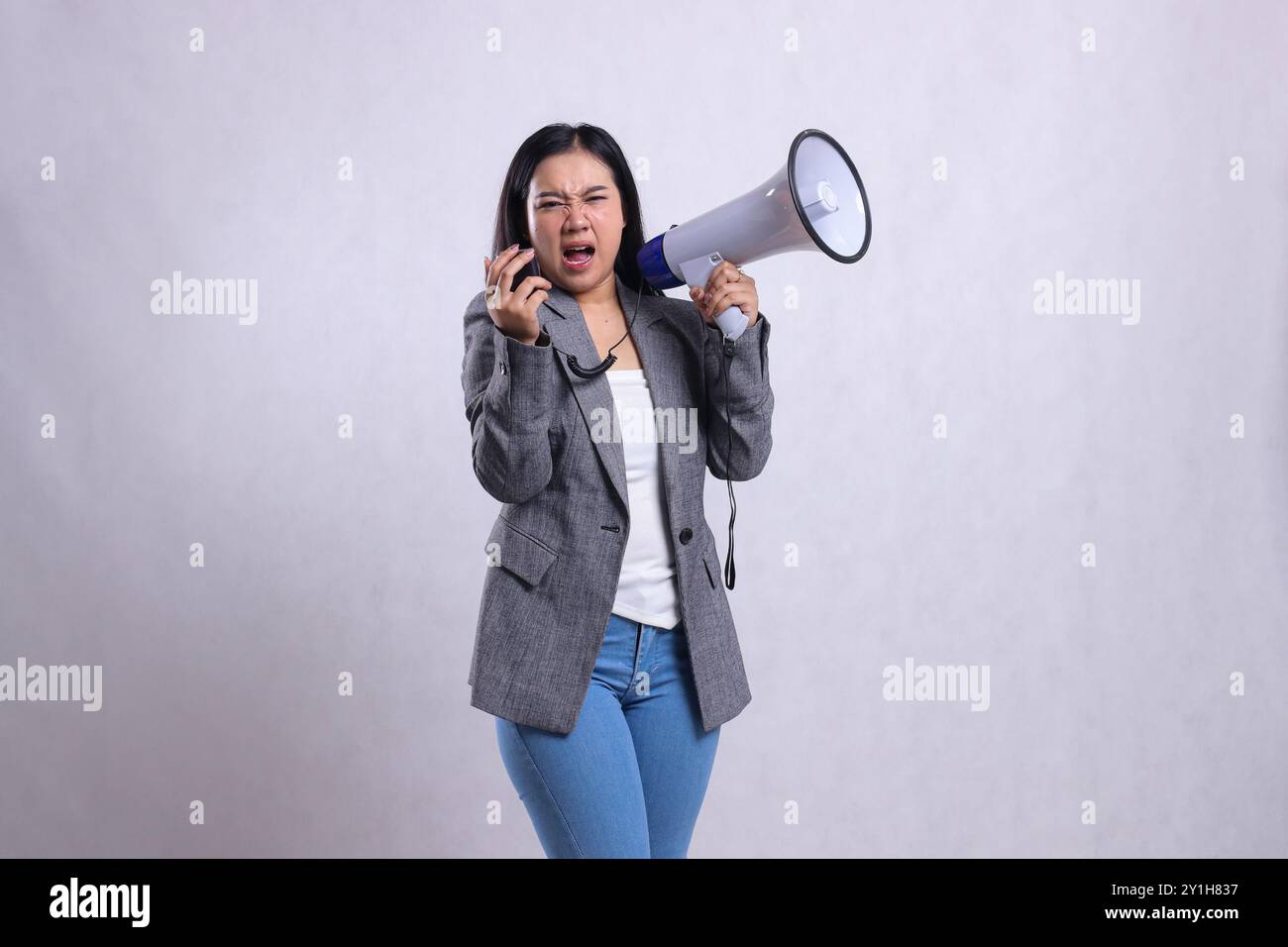 formal beautiful young ladies shouting to the left shouting hand ...