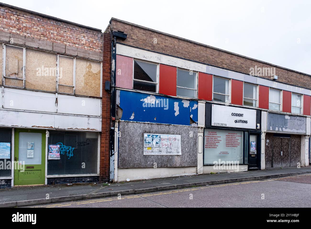 Closed down derelict shops and offices in town centre of Crewe Cheshire ...