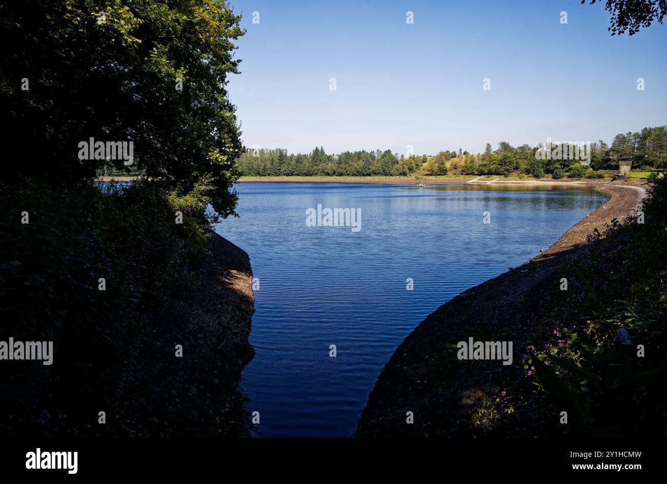 A shady calm inlet of the Turton and Entwistle Reservoir, Blackburn ...