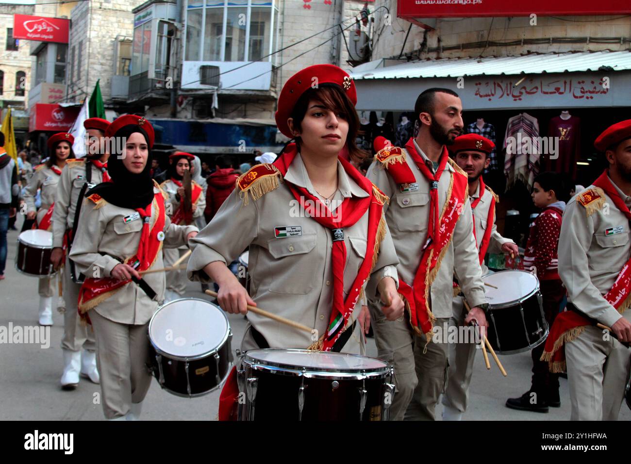 Palestinians Sufis play musical instruments as they parade through the ...
