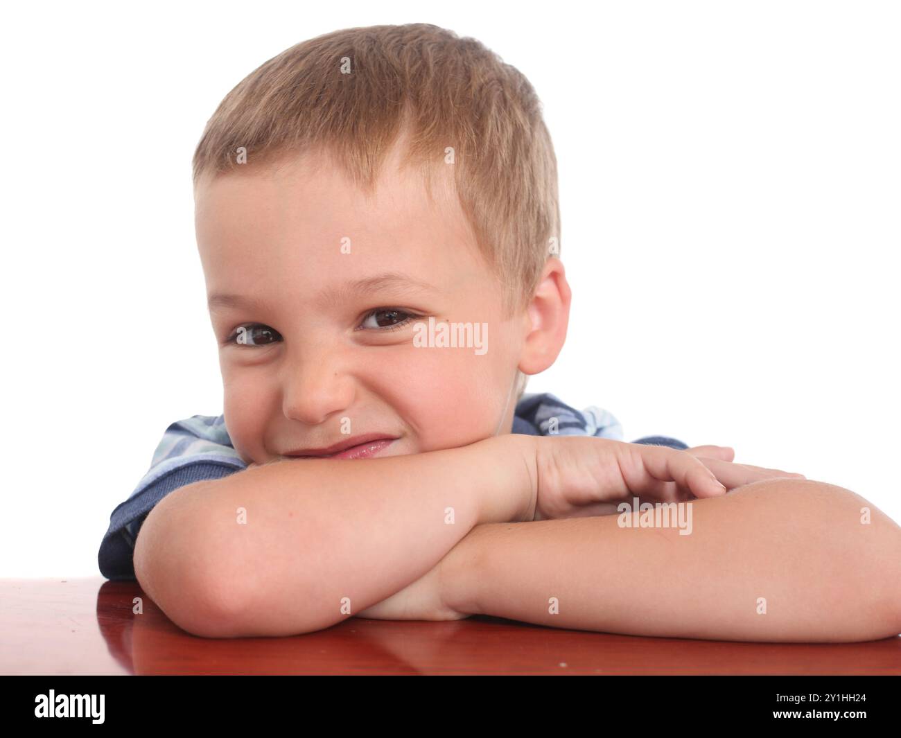 portrait of sly little boy with funny grimace on isolated white ...