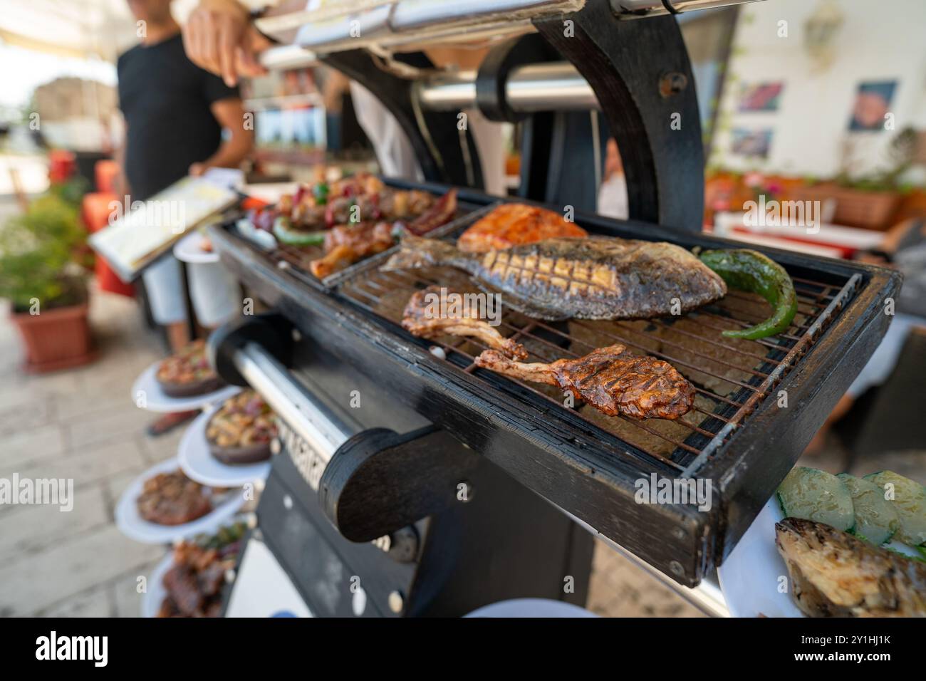 A realistic fake food display outside a restaurant featuring a T-bone ...