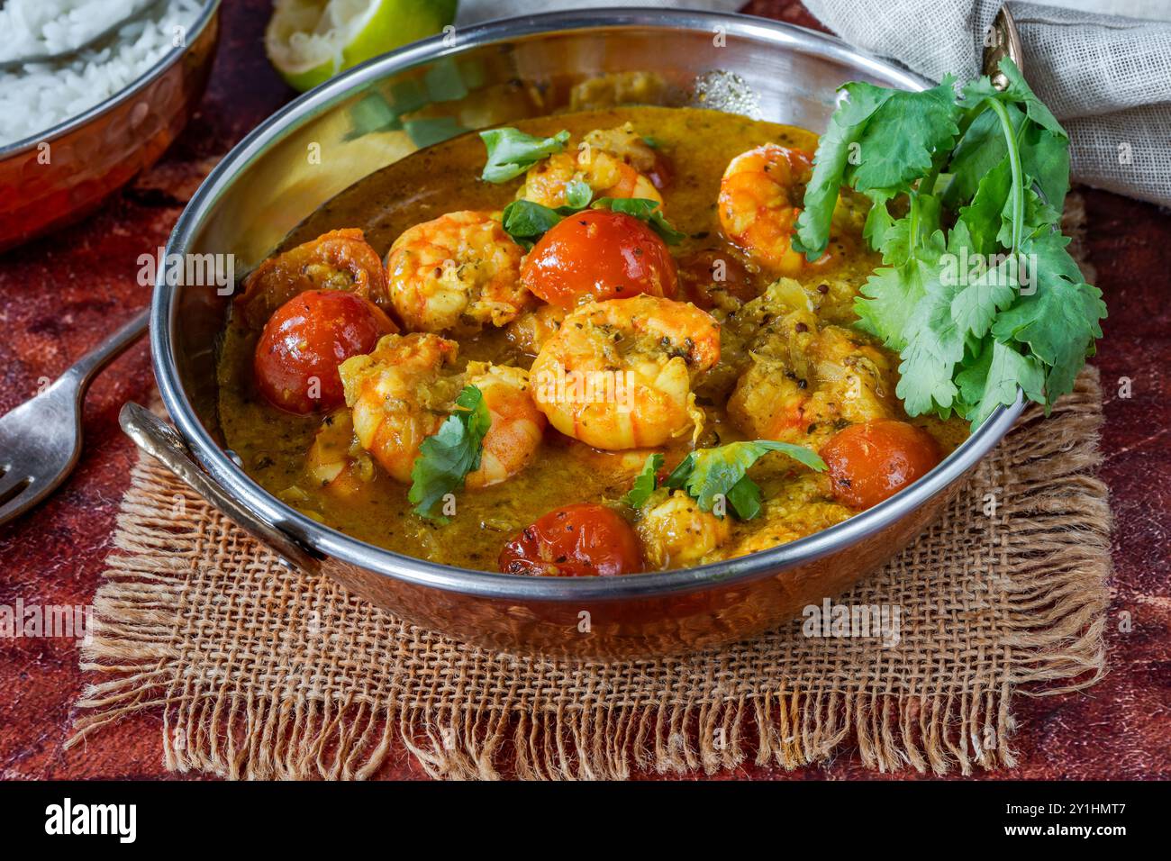 Keralan style prawn, tomato and coconut curry with rice Stock Photo - Alamy