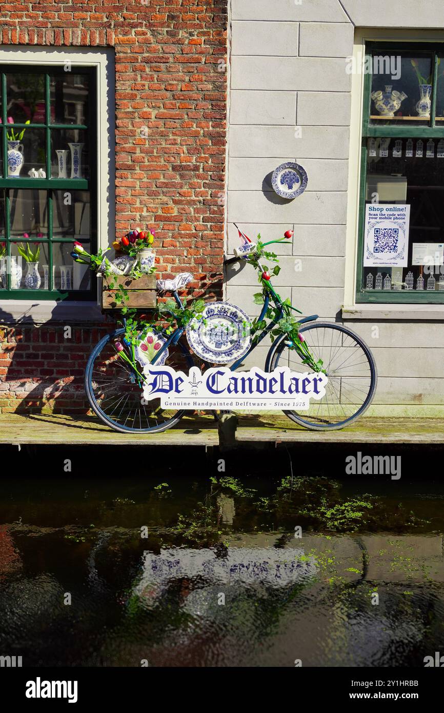 Delft, Netherlands - 19 June 2024 ; Delft blue pottery store along the ...