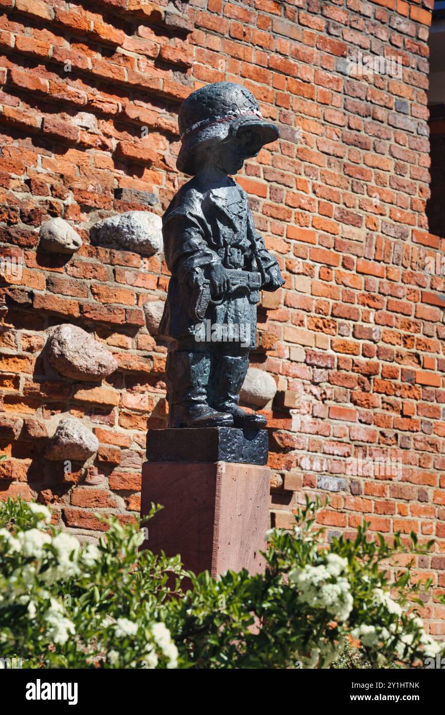 A striking image of the Little Insurgent monument in Warsaw, Poland ...