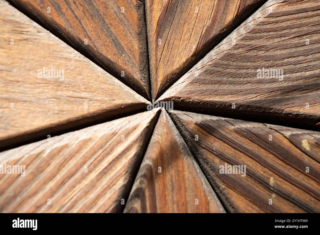 pieces of wood radiating from the center of the photo, close up wood ...