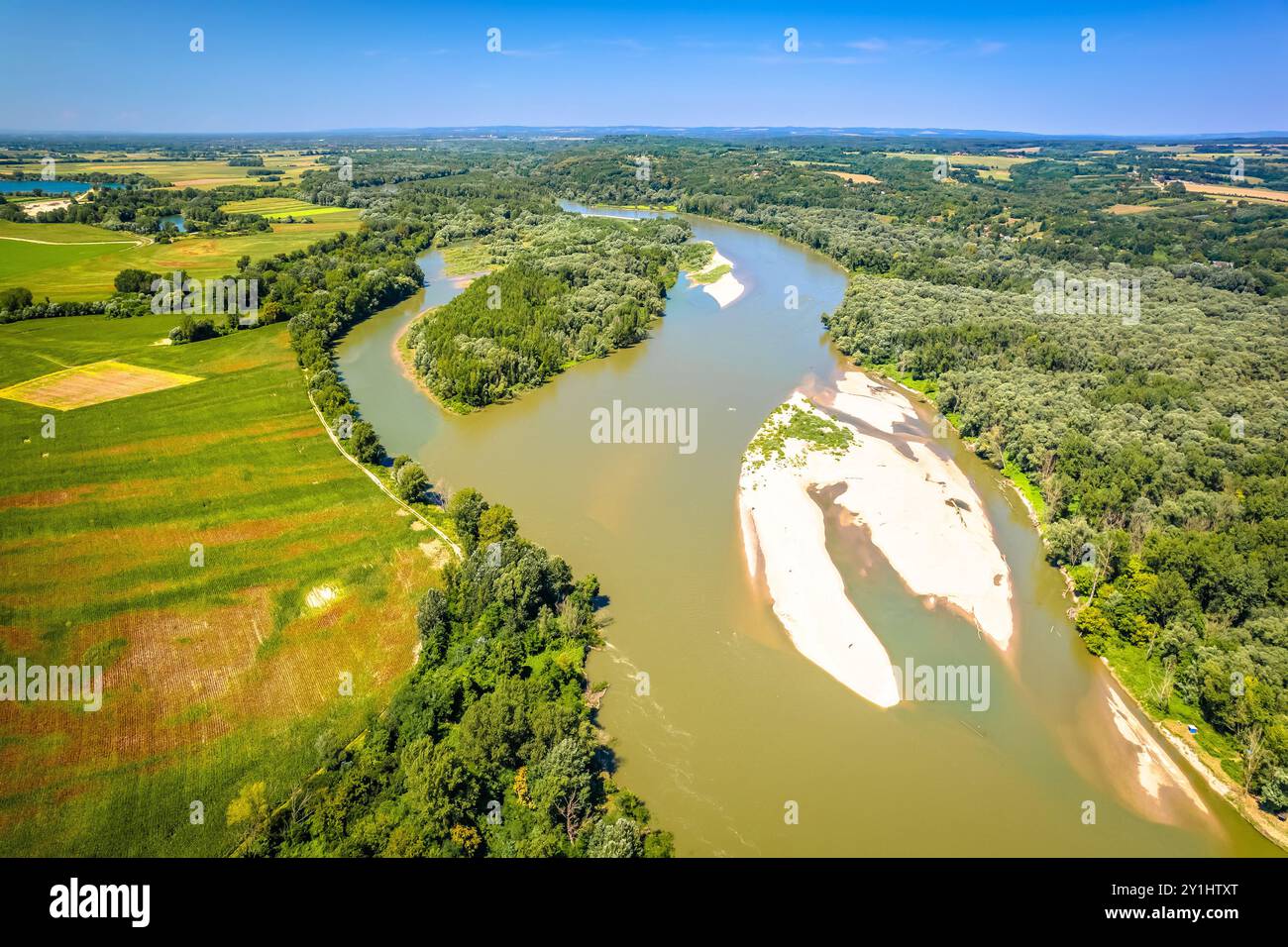 Aerial view of Drava river in Podravina region of Croatia, border with ...