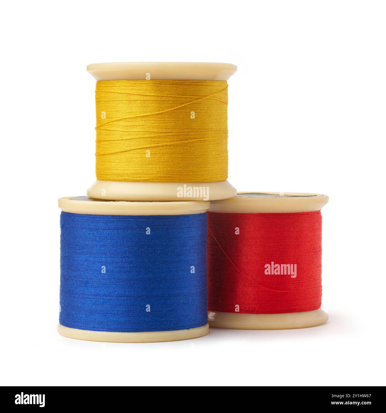 primary colors spool of cotton embroidery sewing thread isolated white ...