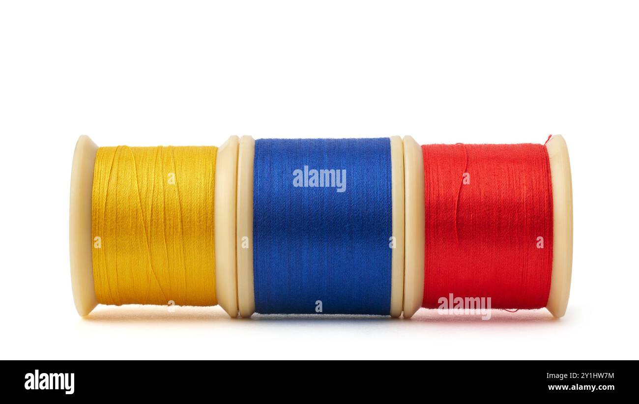 primary colors spool of cotton embroidery sewing thread isolated white ...
